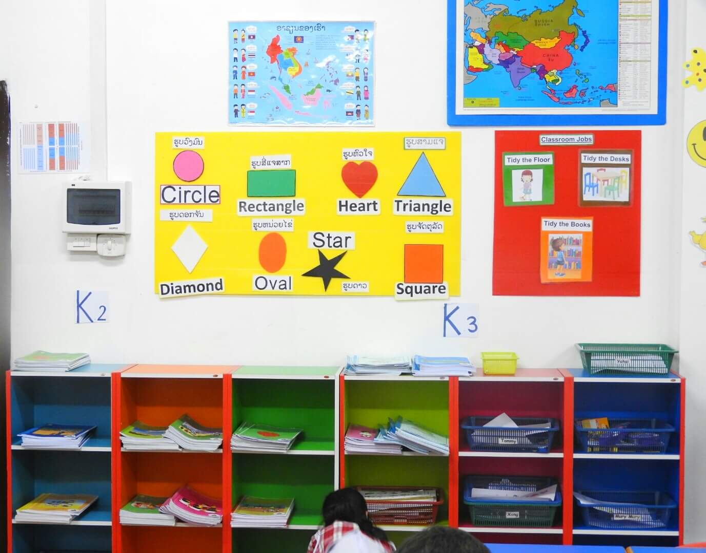 Kindergarten 2 & 3 Teachers John and Nong in their classroom | OSCAR ...